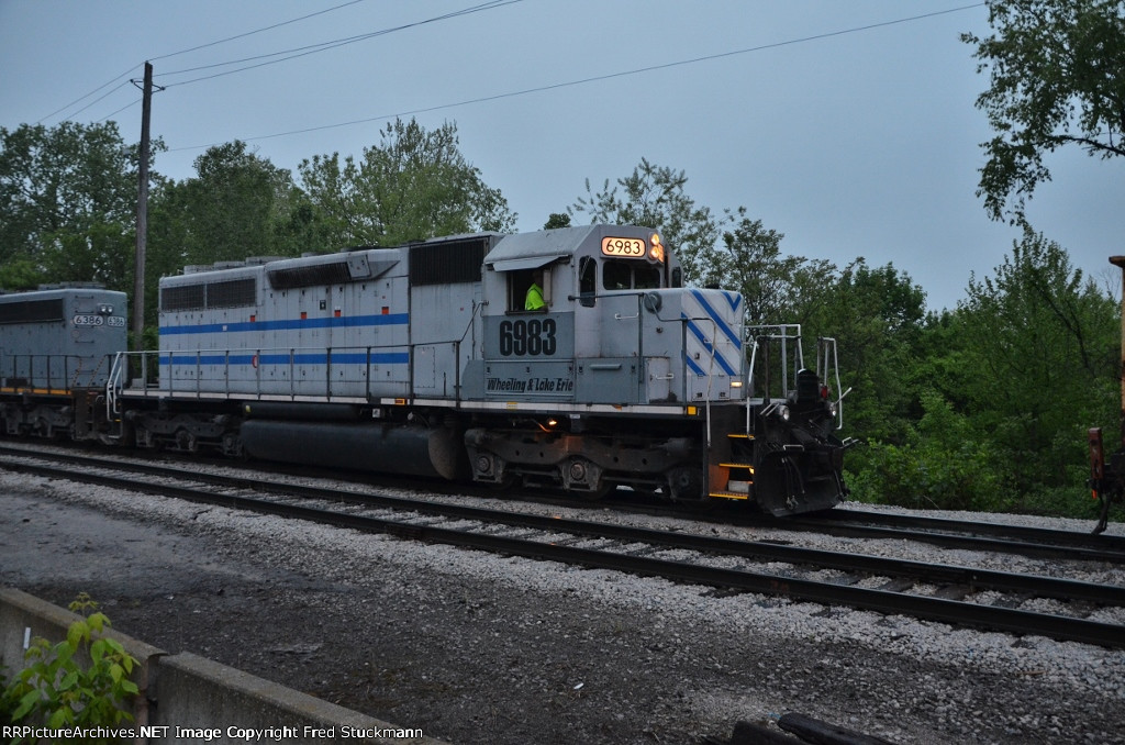 WE 6983 will now tie onto the west end of the train.
